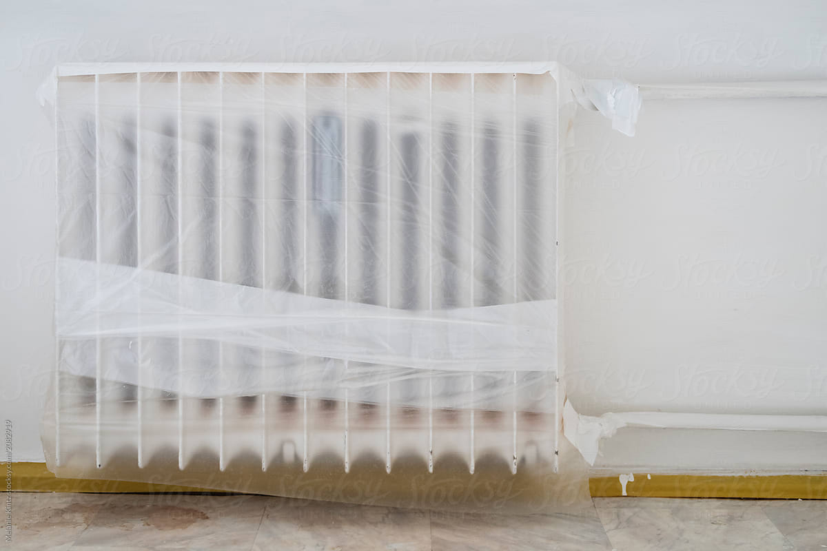 "Oldfashioned Heater Protectively Covered In Plastic During Renovation ...