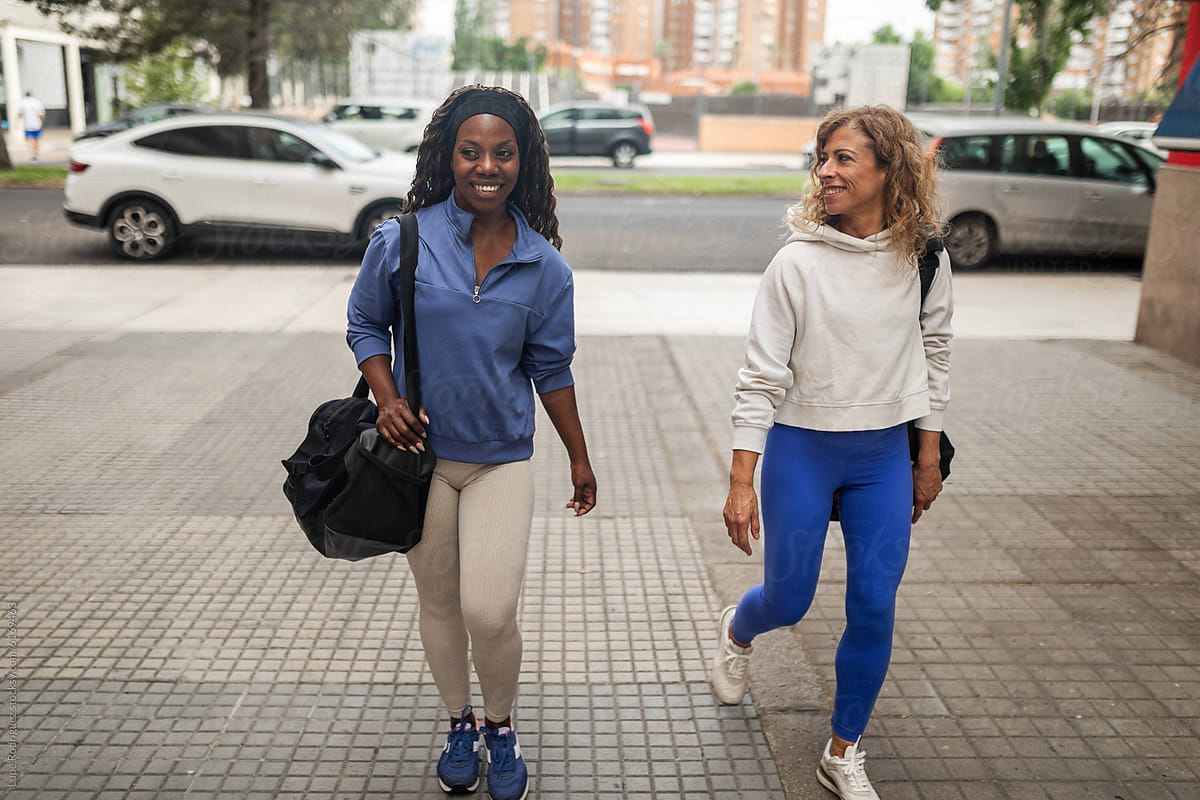 "Multiracial Women Walking On The Street" by Stocksy Contributor "Lupe ...