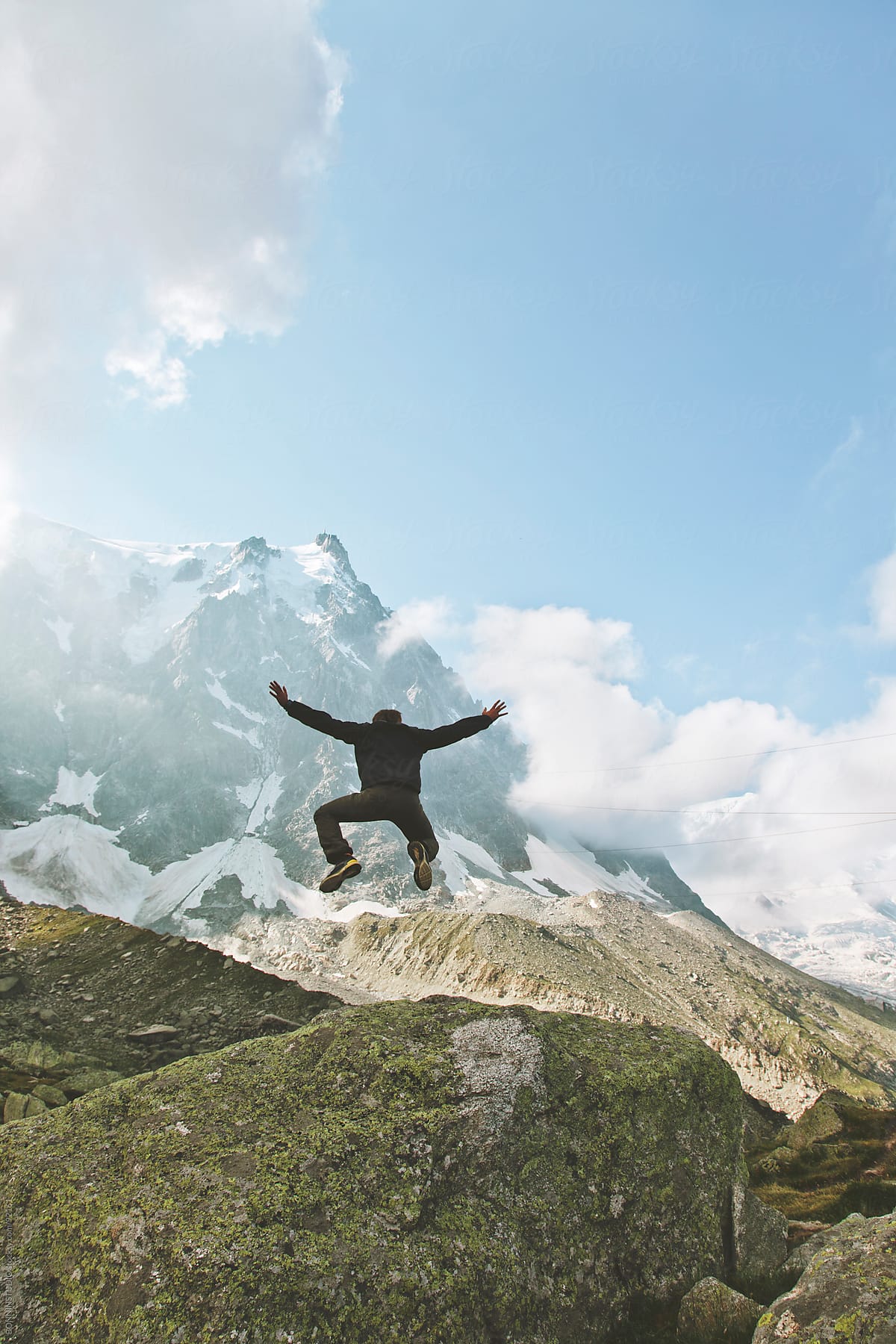"Man Jumping On Mountain Landscape. France." by Stocksy Contributor ...