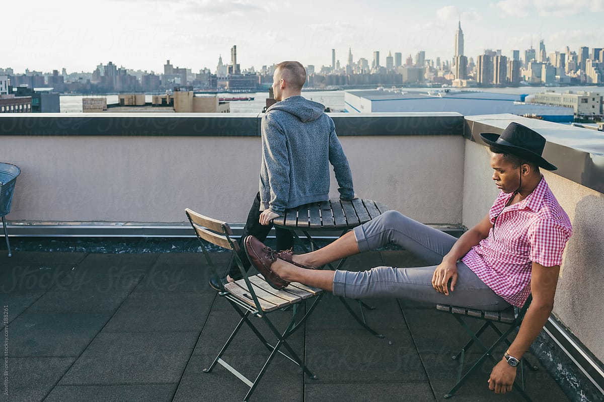 "Friends Hanging Out On A Rooftop With New York Skyline" by Stocksy ...