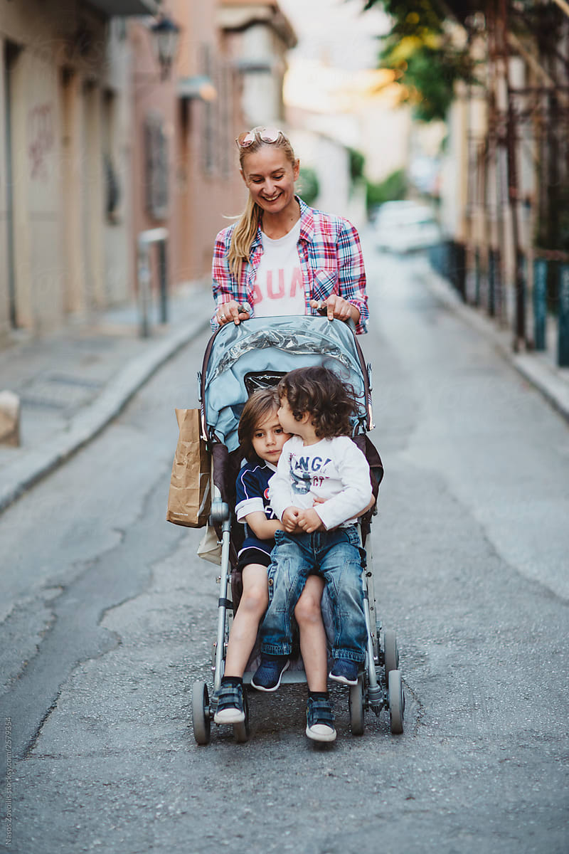 "Mother With Her Kids Outdoor" by Stocksy Contributor "Nasos Zovoilis ...