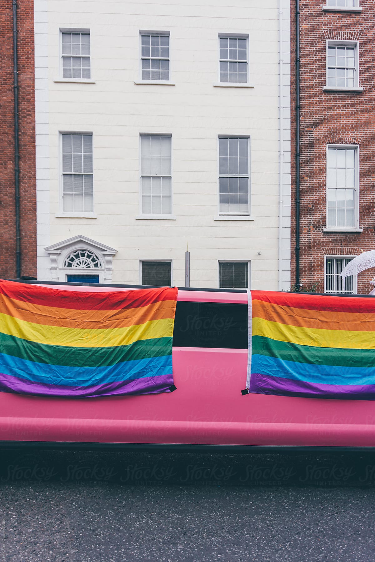 "Pink Limousine With Rainbow Flag On The Street . Gay Pride" by Stocksy ...