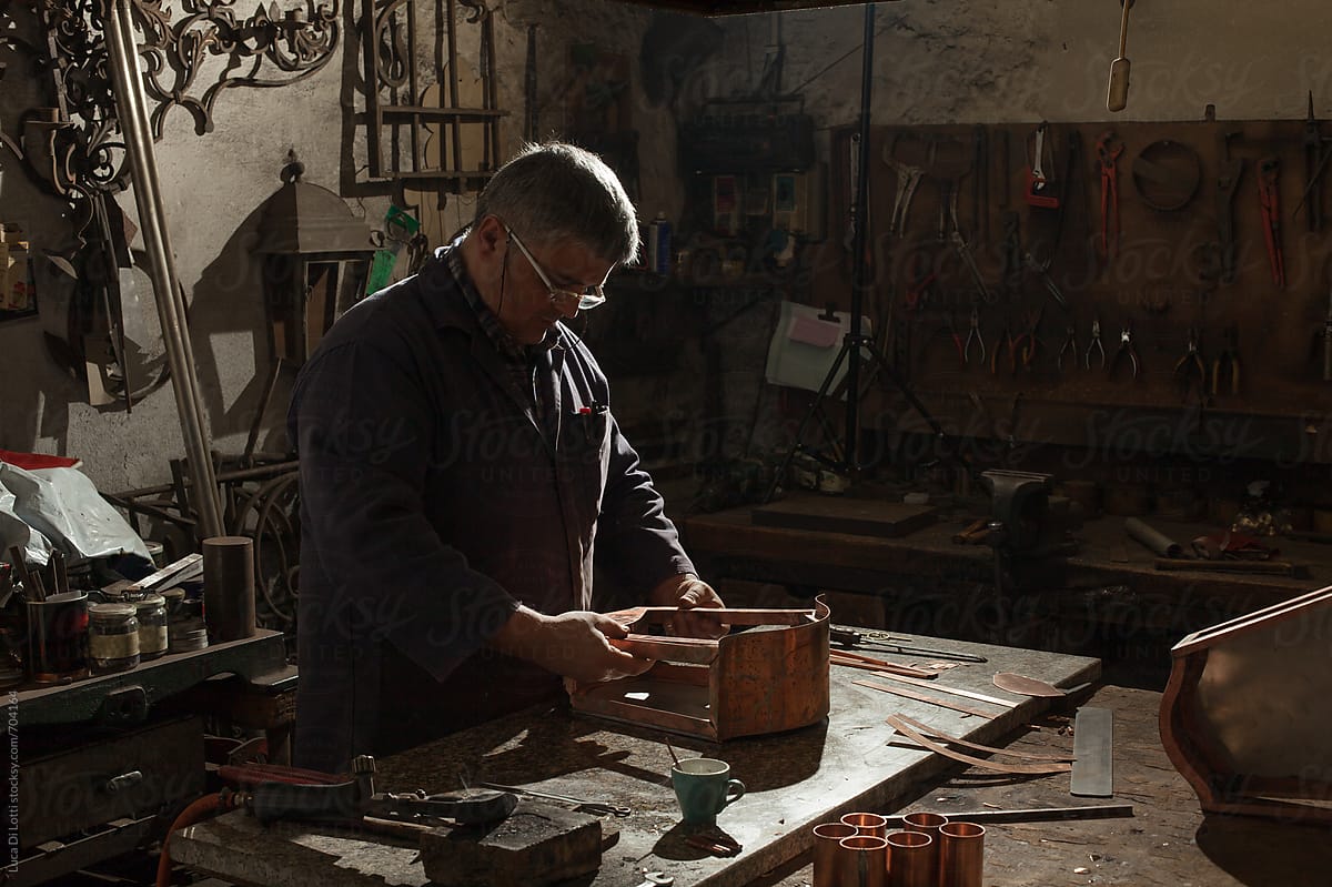 "Blacksmith Soldering Parts Of Copper" by Stocksy Contributor "Luca Di ...