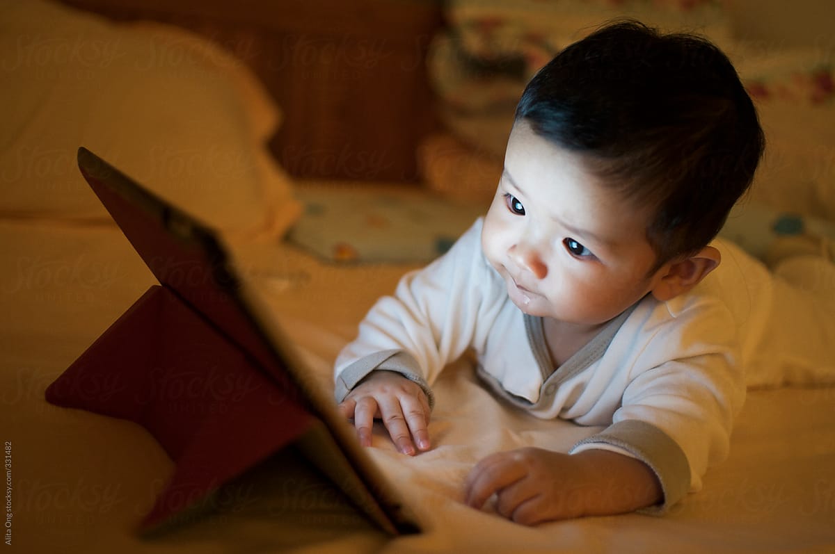 "Baby Starring At Table" by Stocksy Contributor "Alita ." - Stocksy