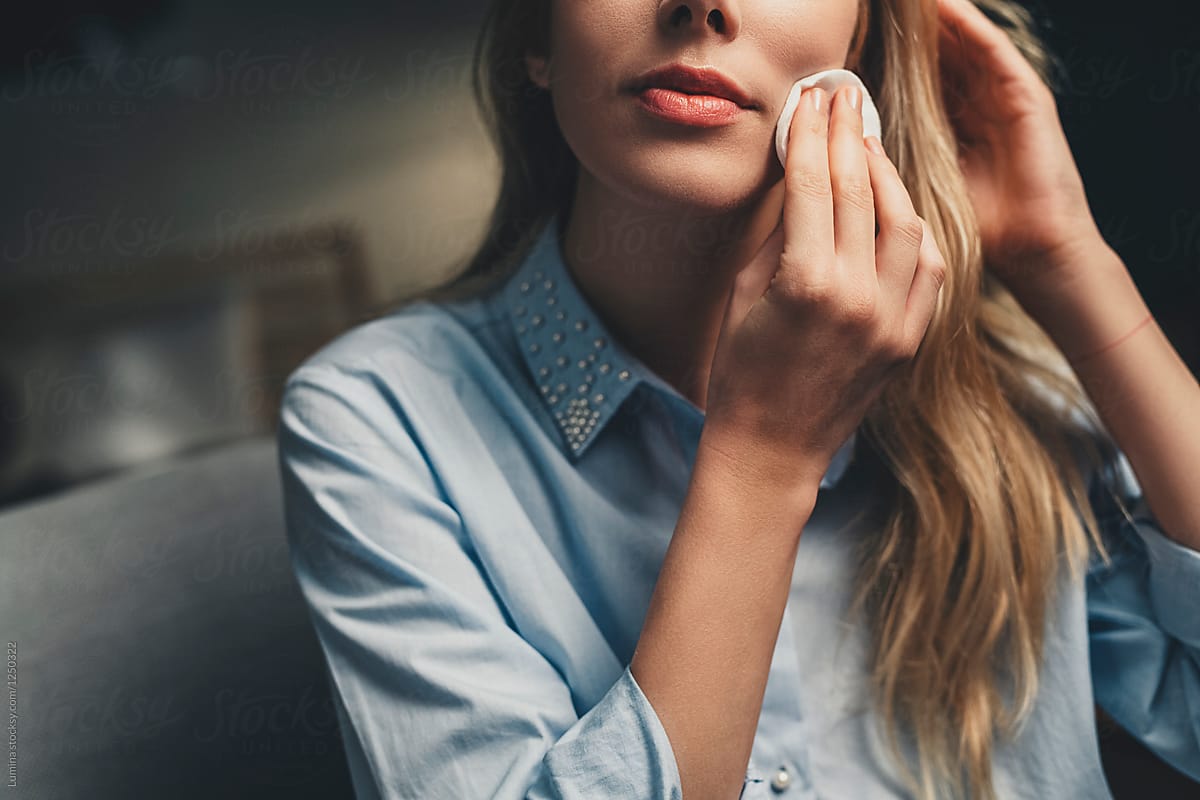 "Woman Cleaning Her Face" by Stocksy Contributor "Lumina" - Stocksy