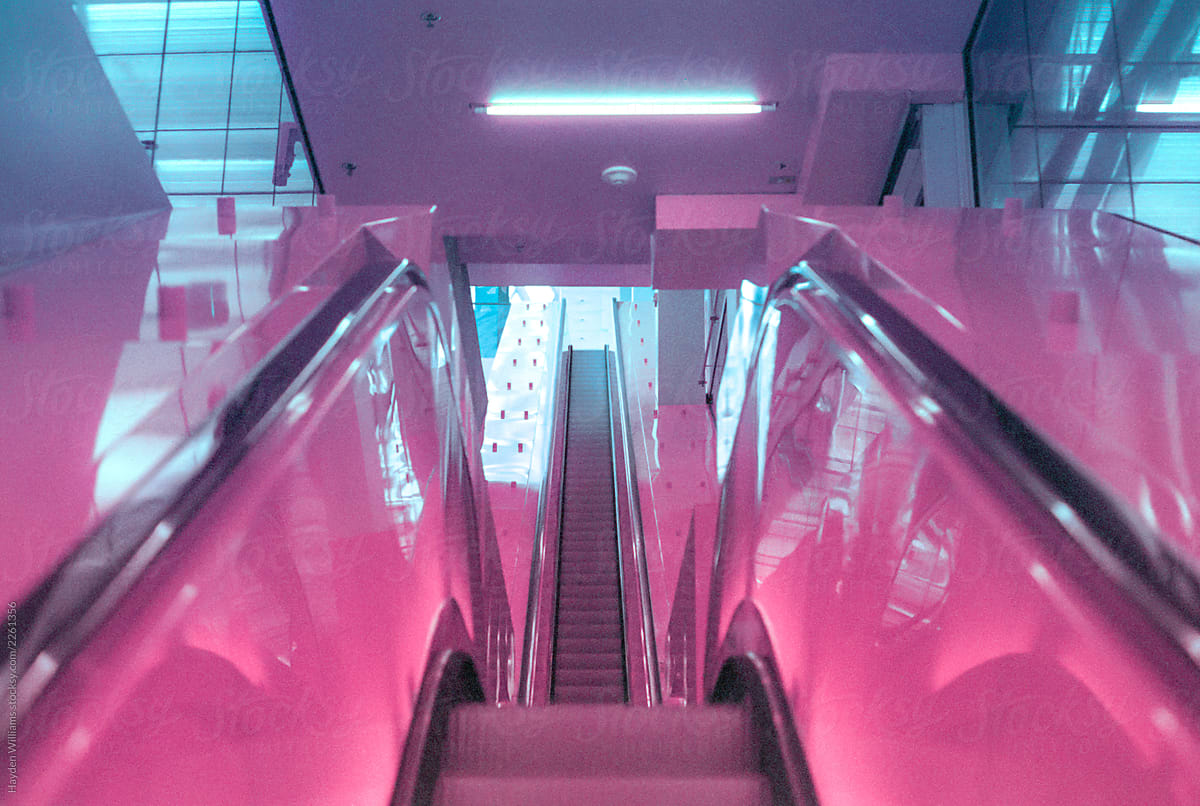 Why the Pink Jacket Escalator Girl Still Haunts Your Feed ...