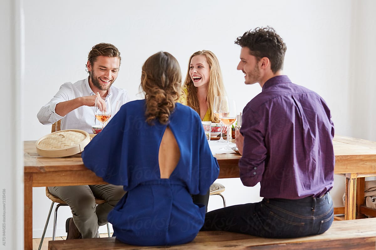 "Happy Couples Having Lunch At Dining Table" by Stocksy Contributor ...