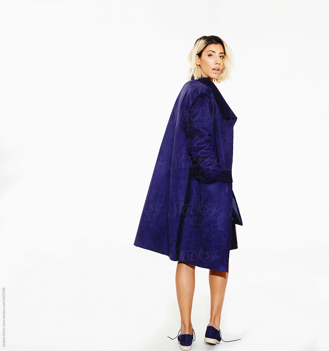 "Fashion Model Posing In Studio With Warm Cloths!" by Stocksy ...