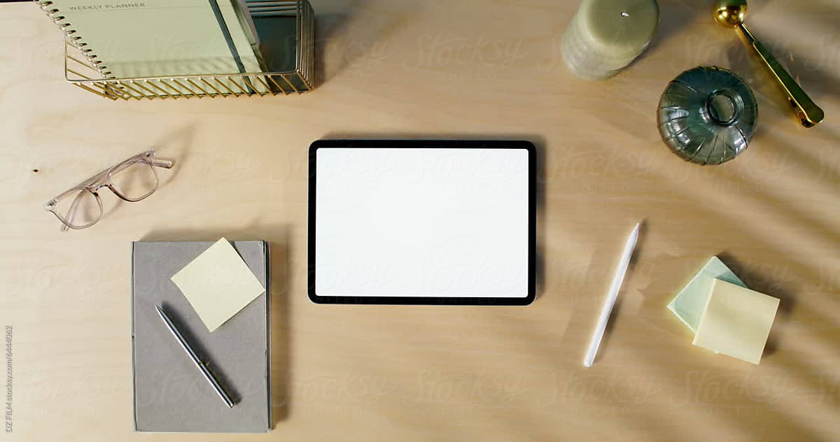"A Tablet With White Screen On The Table" by Stocksy Contributor "DZ ...