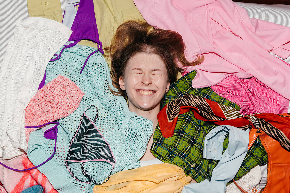 "Woman Buried In Fashion Clothing" by Stocksy Contributor "Lucas Ottone ...