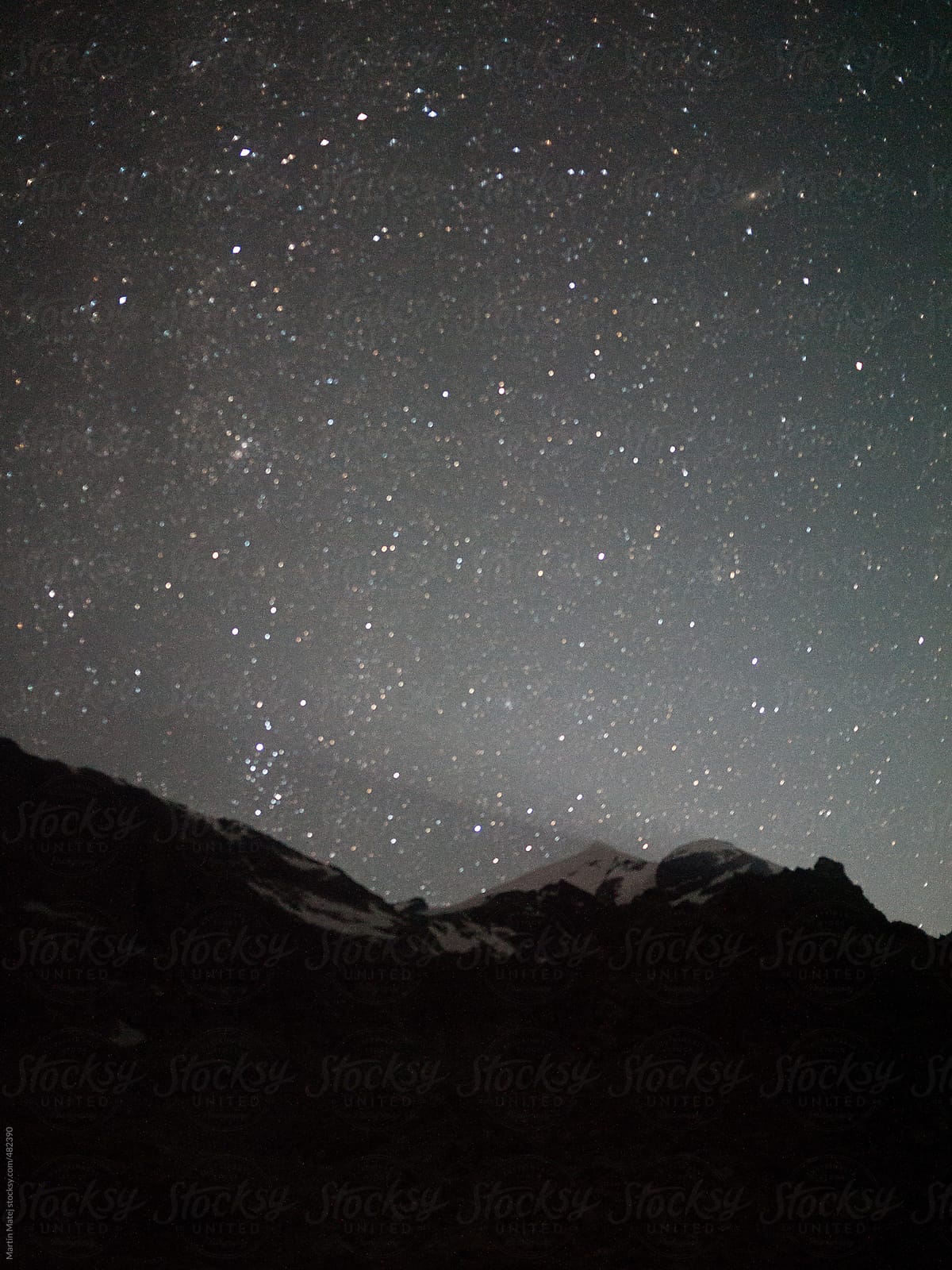"Stars Over Snowy Mountain At Night" by Stocksy Contributor "Martin ...