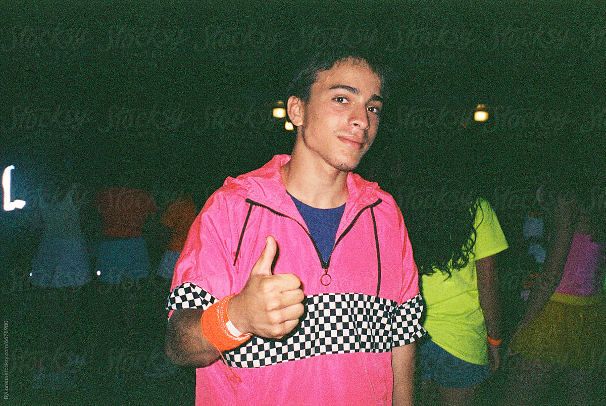 "Neon Party Thumbs Up" by Stocksy Contributor "ByLorena" - Stocksy