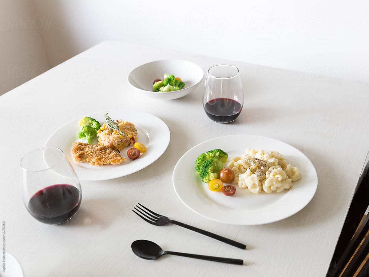 "Plates Of Food On White Table" by Stocksy Contributor "Sophia Hsin ...