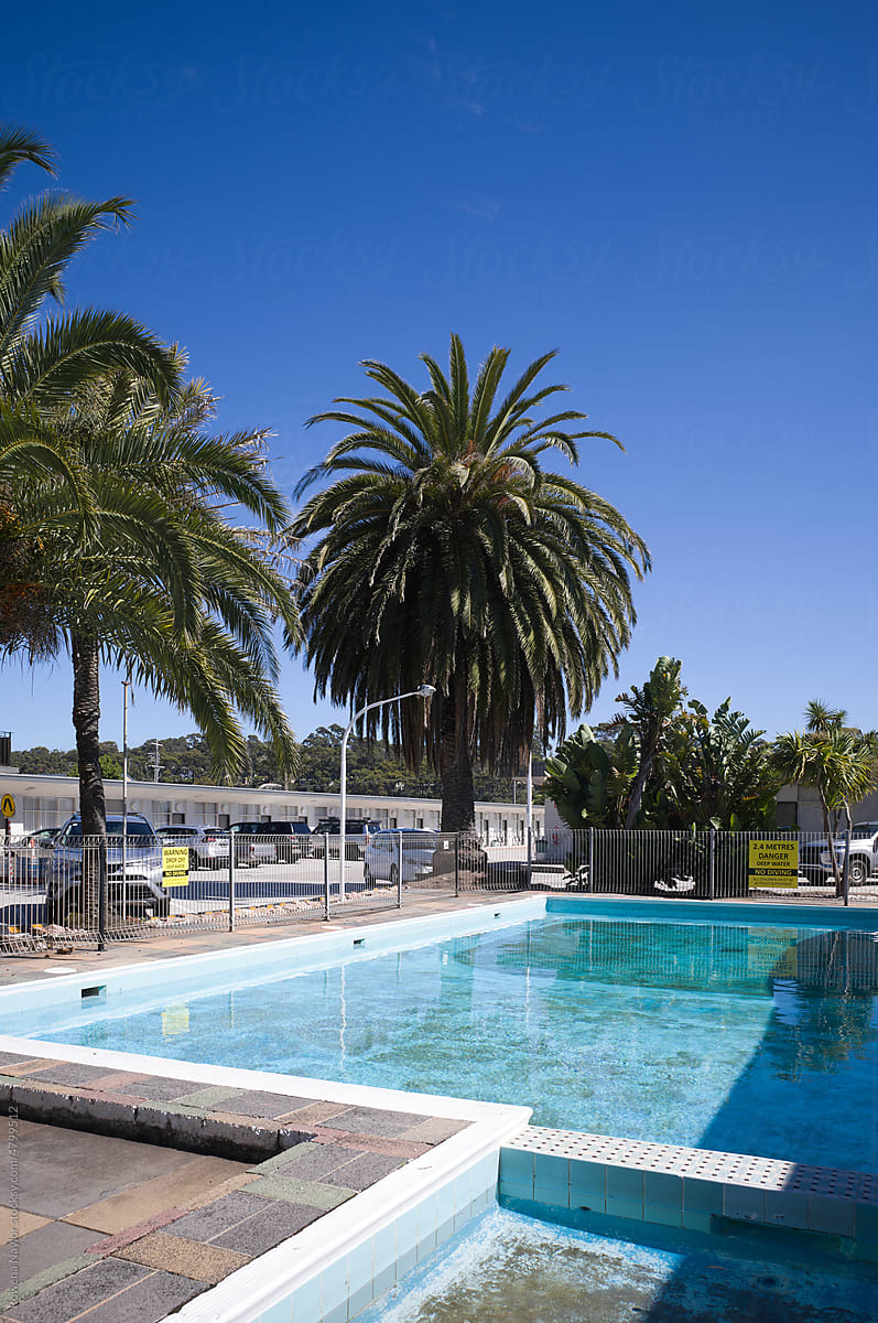 "Swimming Pool At Holiday Park" by Stocksy Contributor "Rowena Naylor ...