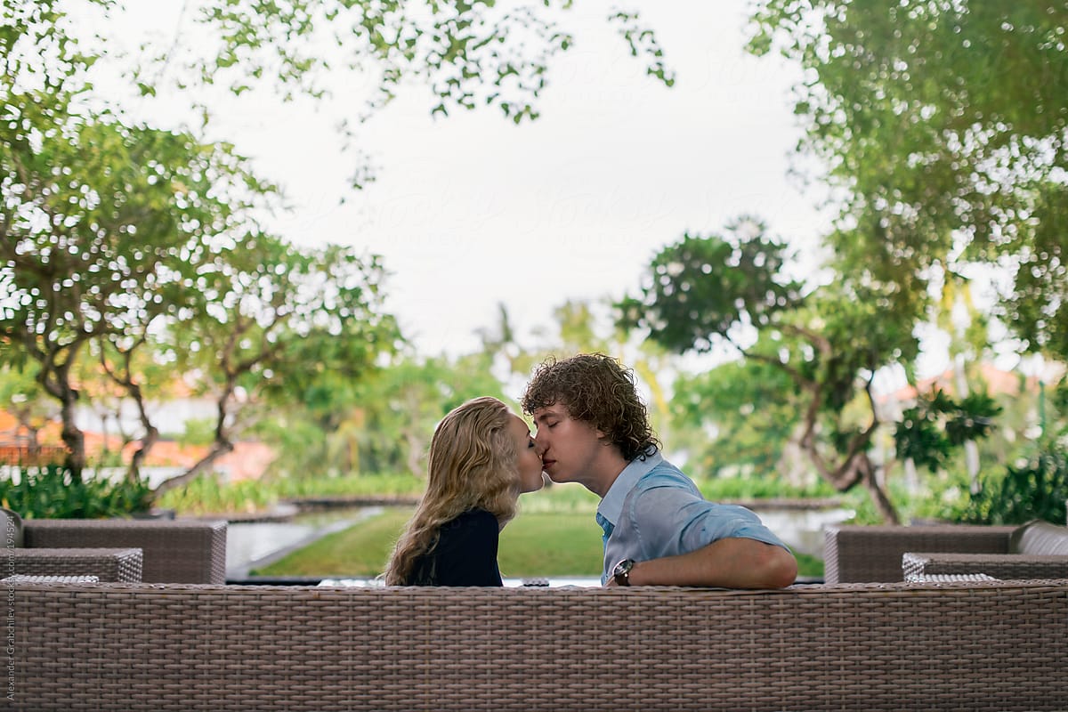 "Romantic Kiss In A Garden Oasis" by Stocksy Contributor "Alexander ...