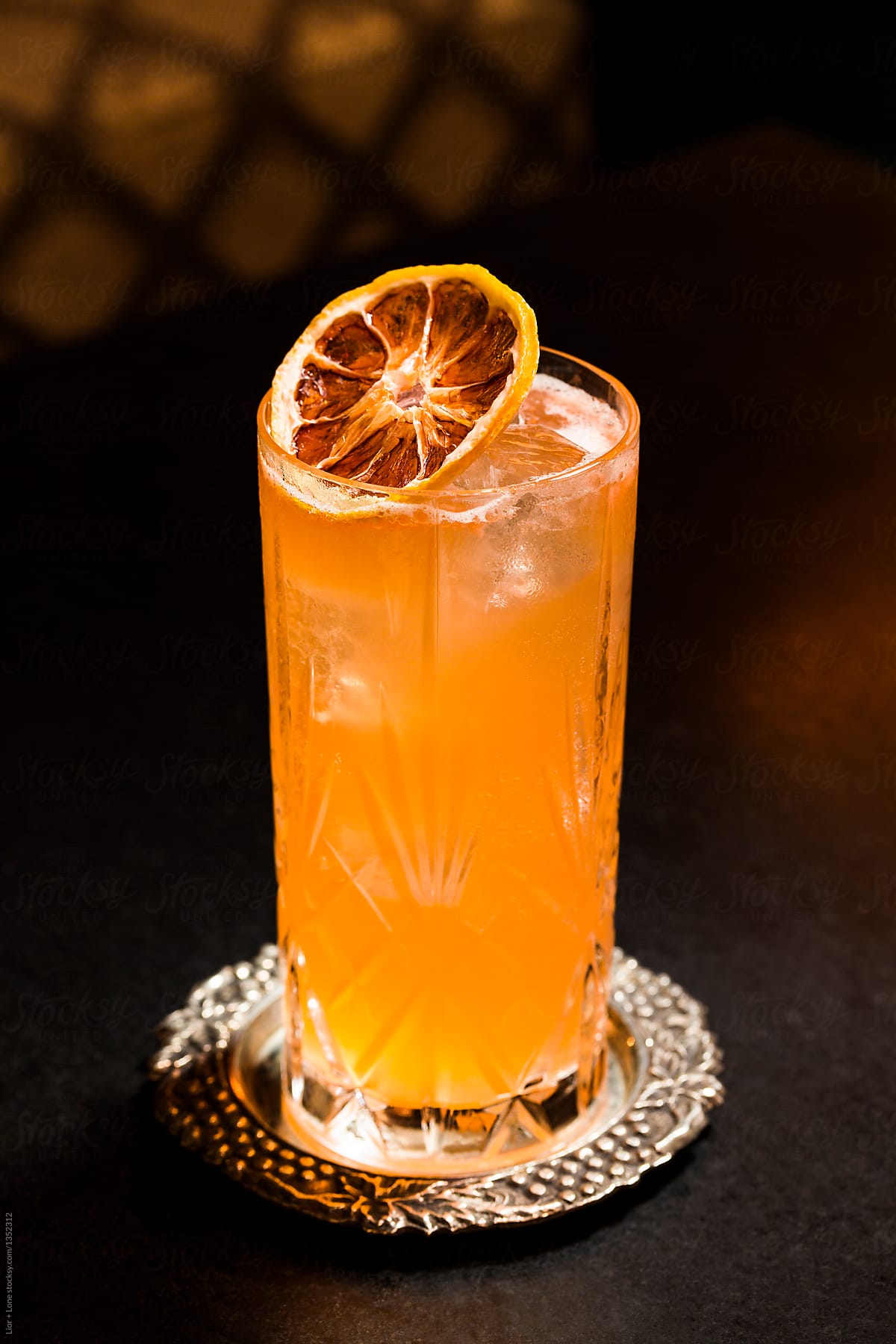"Orange Cocktail Served In A Vintage Crystal Highball Glass" by Stocksy ...