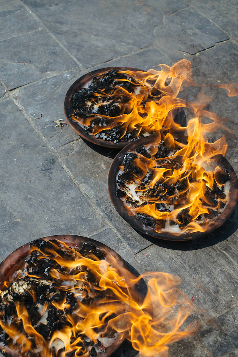 "Fire Pooja" by Stocksy Contributor "Artem Zhushman" - Stocksy
