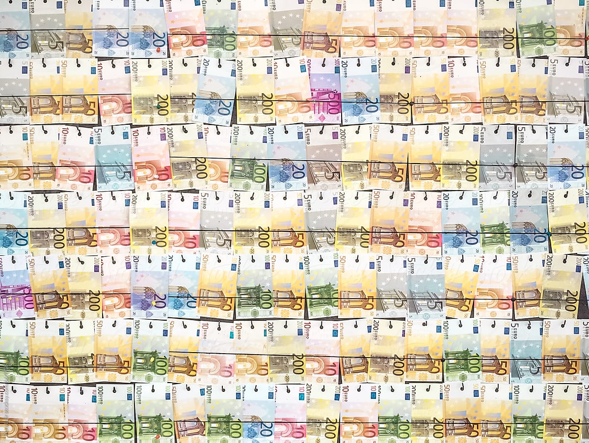 "Wall Of Fake Money" by Stocksy Contributor "Vera Lair" - Stocksy