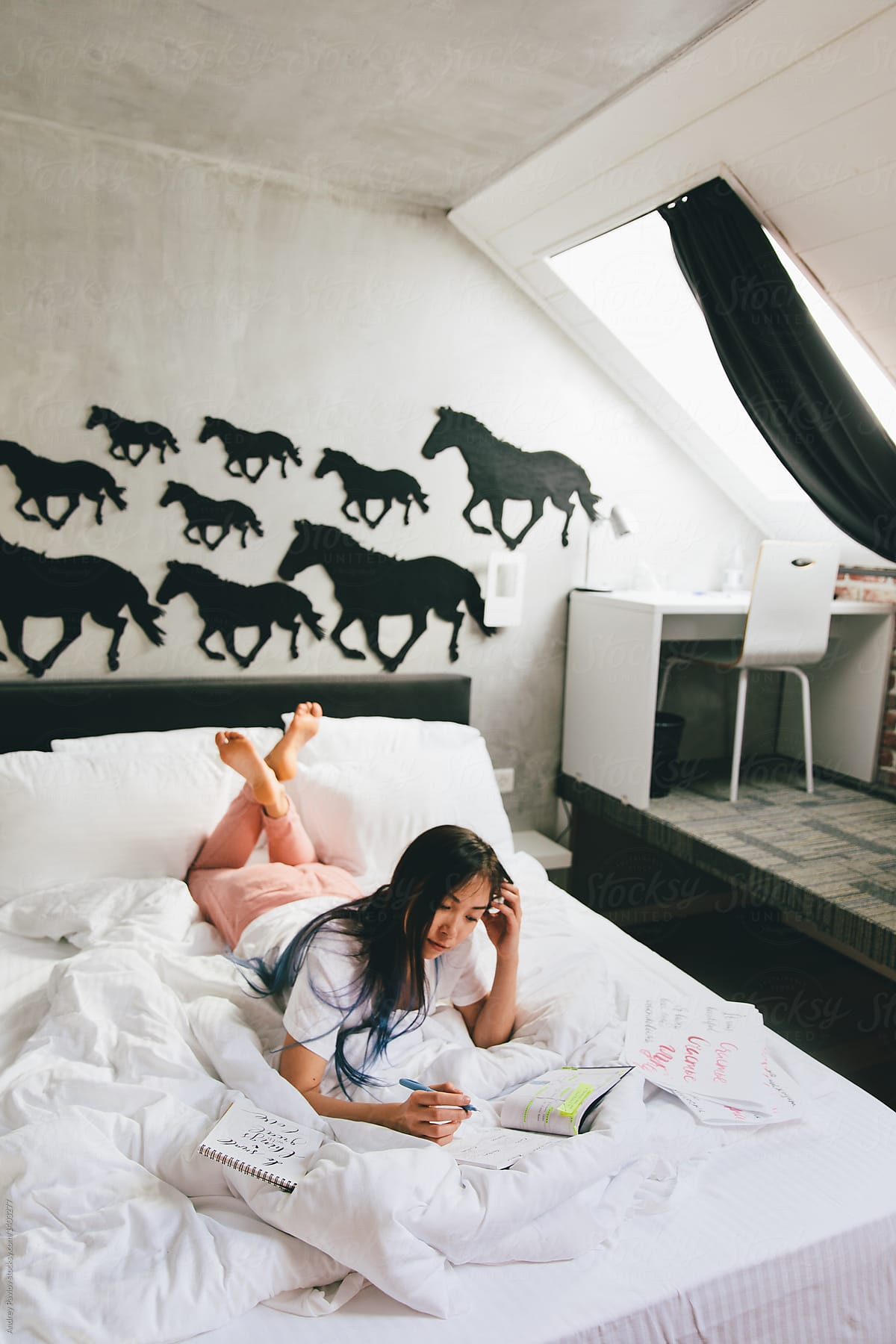 "Woman Relaxing On Bed And Taking Notes" by Stocksy Contributor "Andrey ...