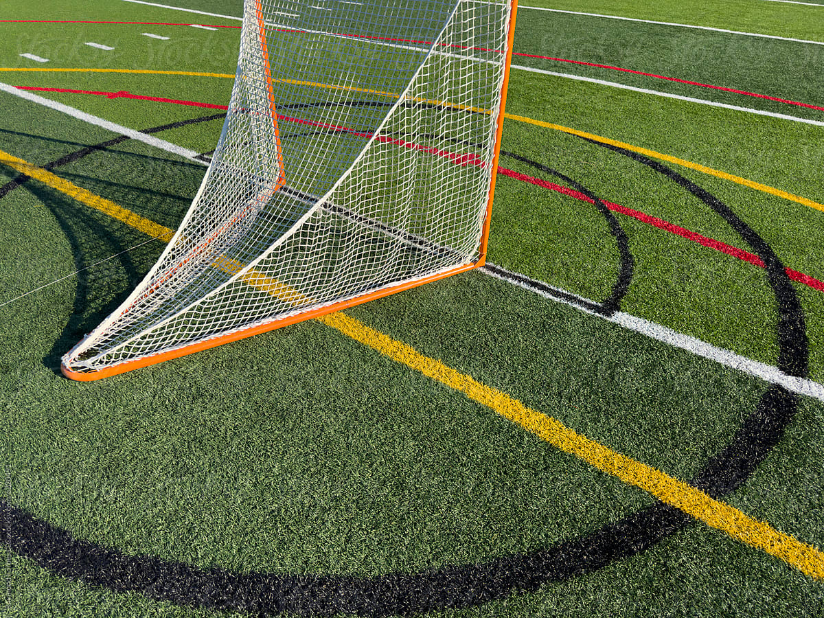"Artificial Turf Lacrosse Field Net" by Stocksy Contributor "Raymond ...
