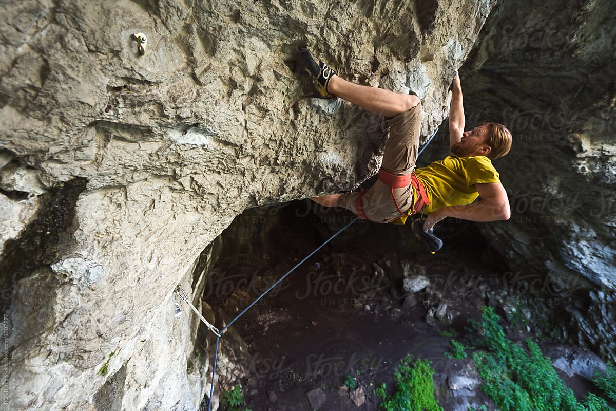 "Man Climbing Overhanging Route Above A Cave" by Stocksy Contributor ...