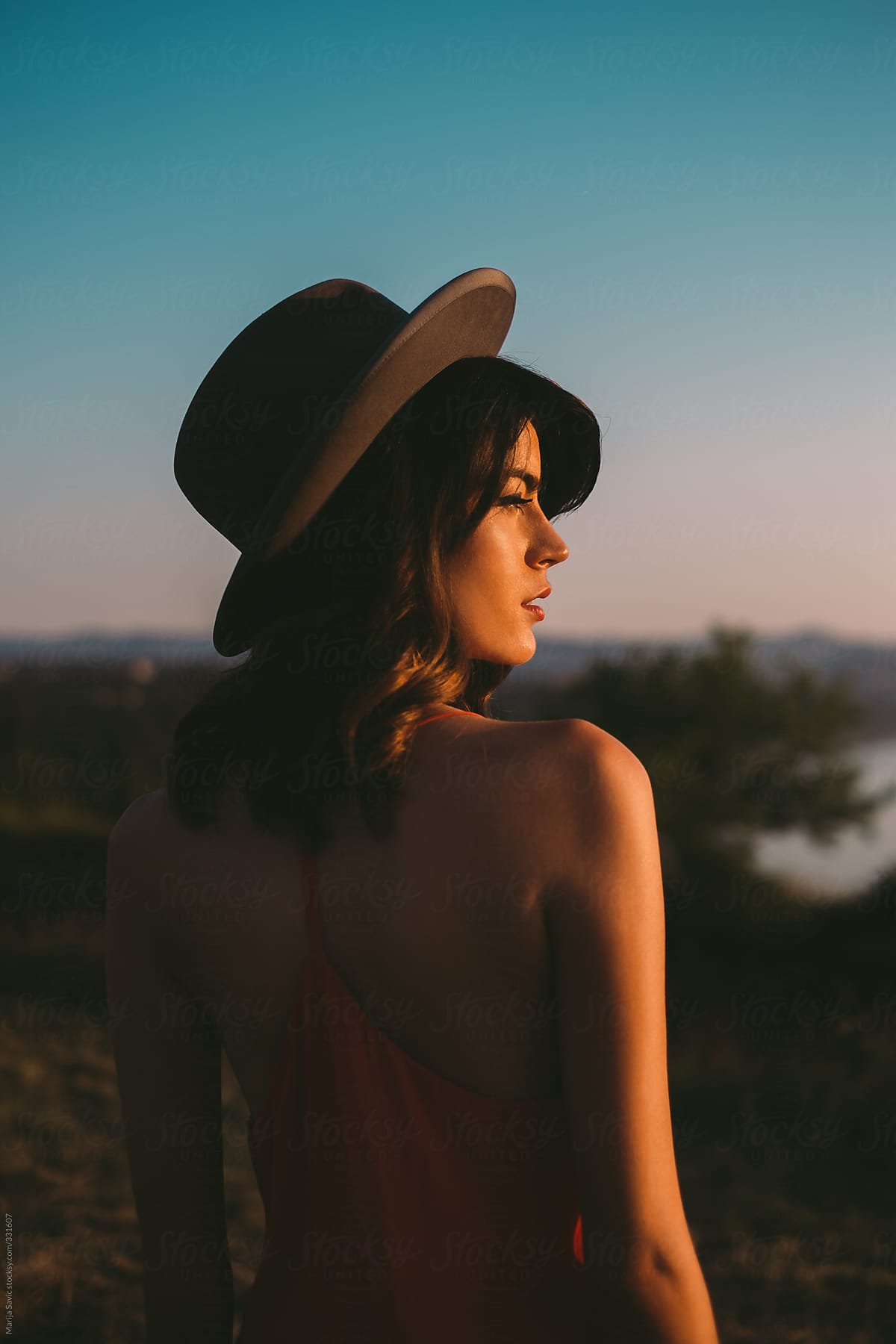"Beautiful Woman During Sunset" by Stocksy Contributor "Maia Images ...
