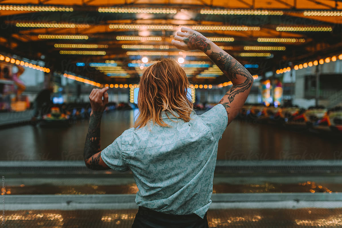 "Girl Dancing In The Amusement Park" by Stocksy Contributor "THAIS ...