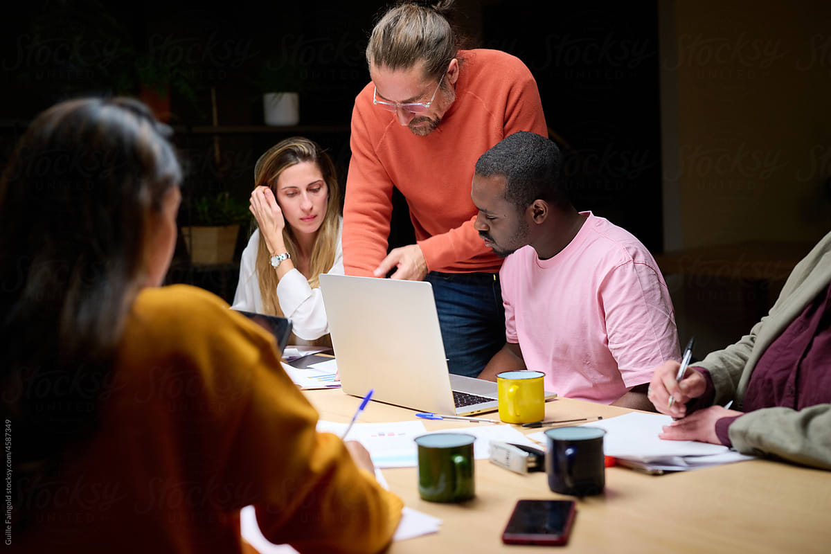 Man working on project with colleagues - Stock Image - Everypixel