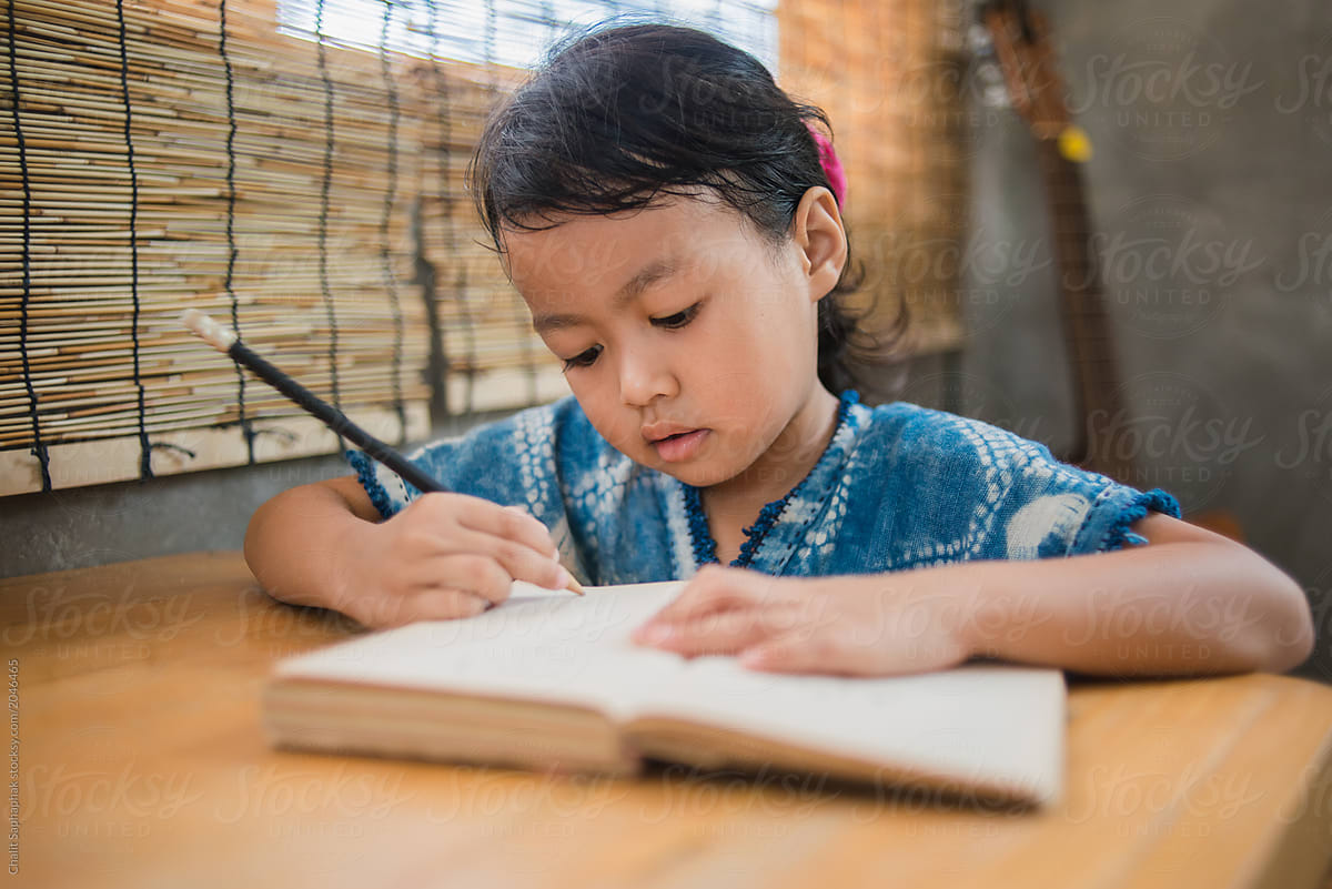"Asian Children Drawing" by Stocksy Contributor "Chalit Saphaphak ...