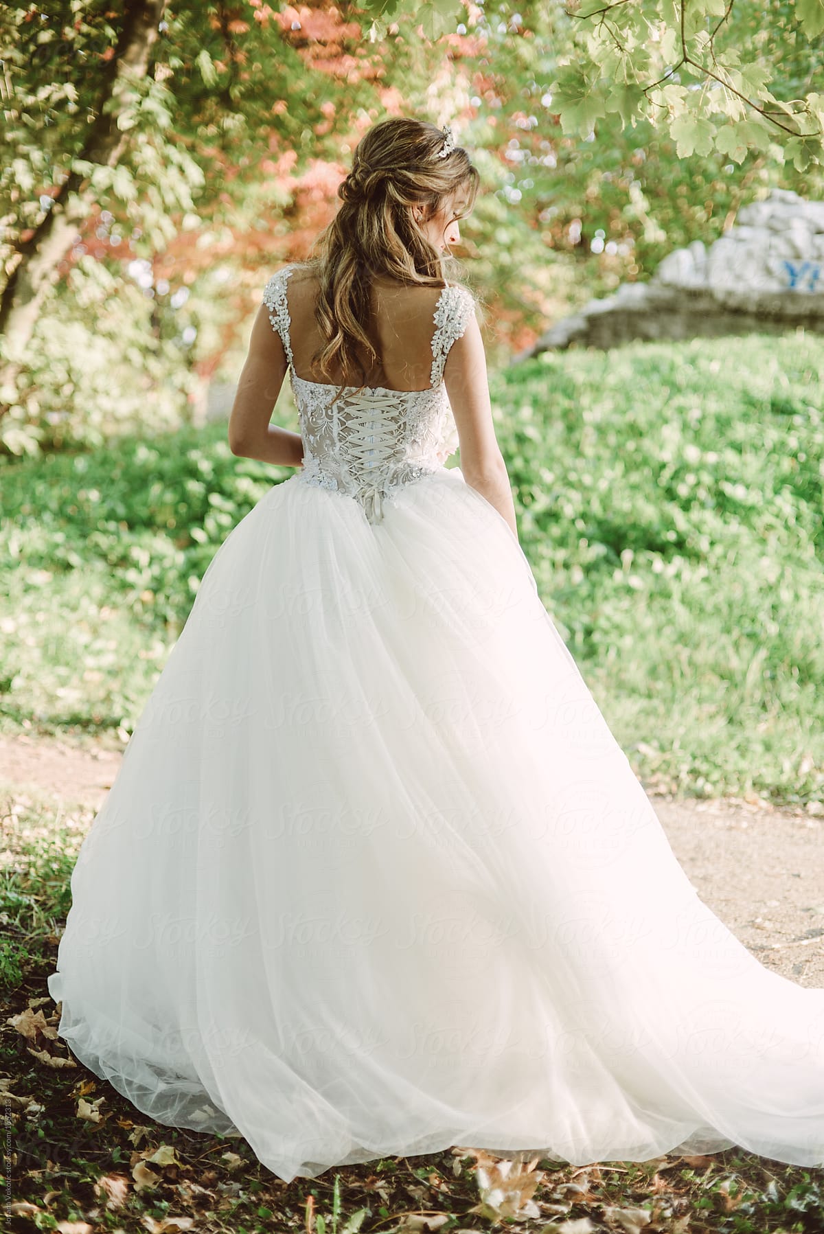 "Bride From The Back" by Stocksy Contributor "Jovana Vukotic" - Stocksy