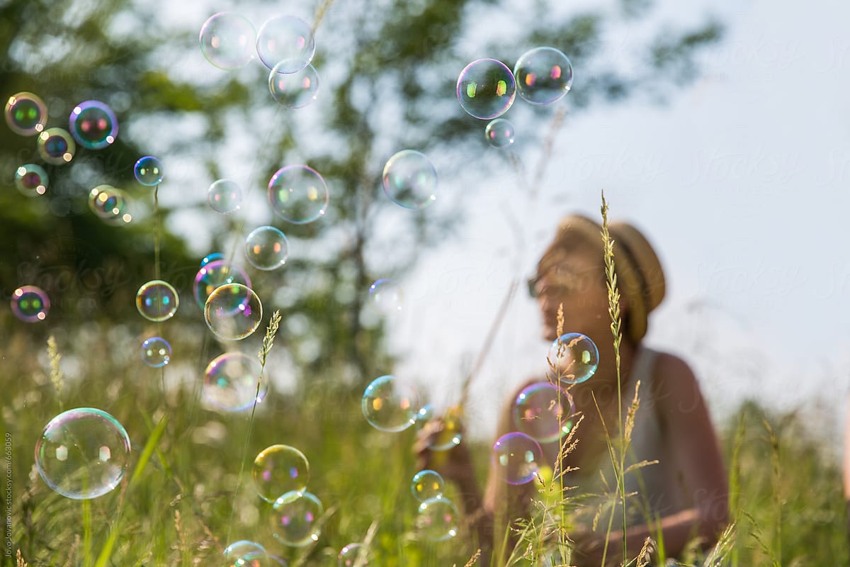 "Bubbles In An Open Field" by Stocksy Contributor "Jovo Jovanovic ...