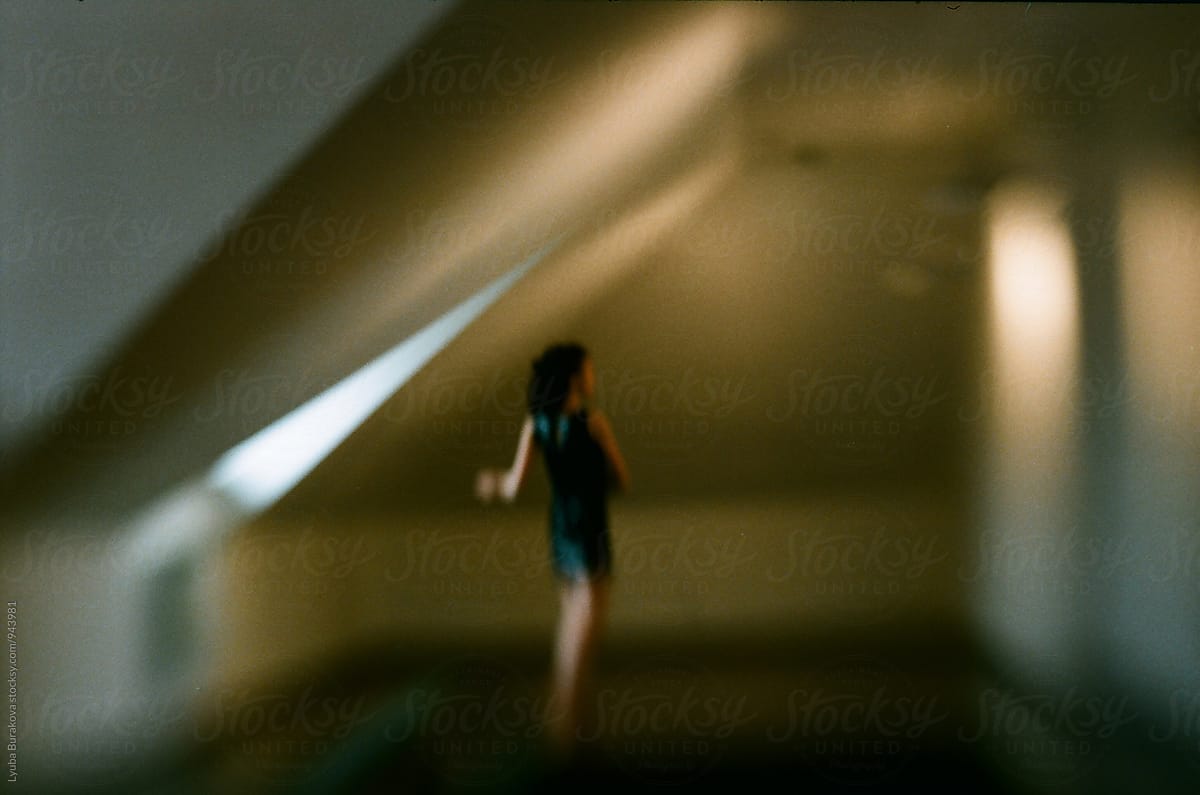 "Woman Dancing In A Loft" by Stocksy Contributor "Amor Burakova" - Stocksy