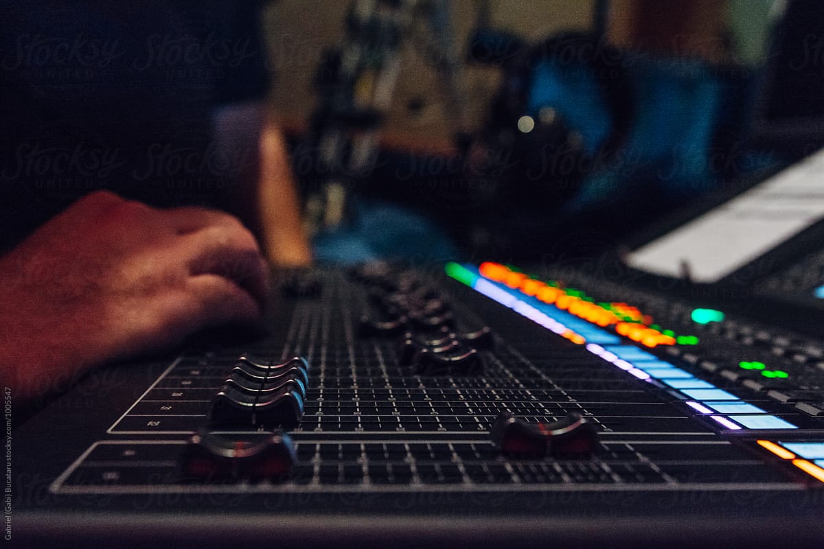 "Hands Of A Sound Engineer On A Mixing Board" by Stocksy Contributor ...