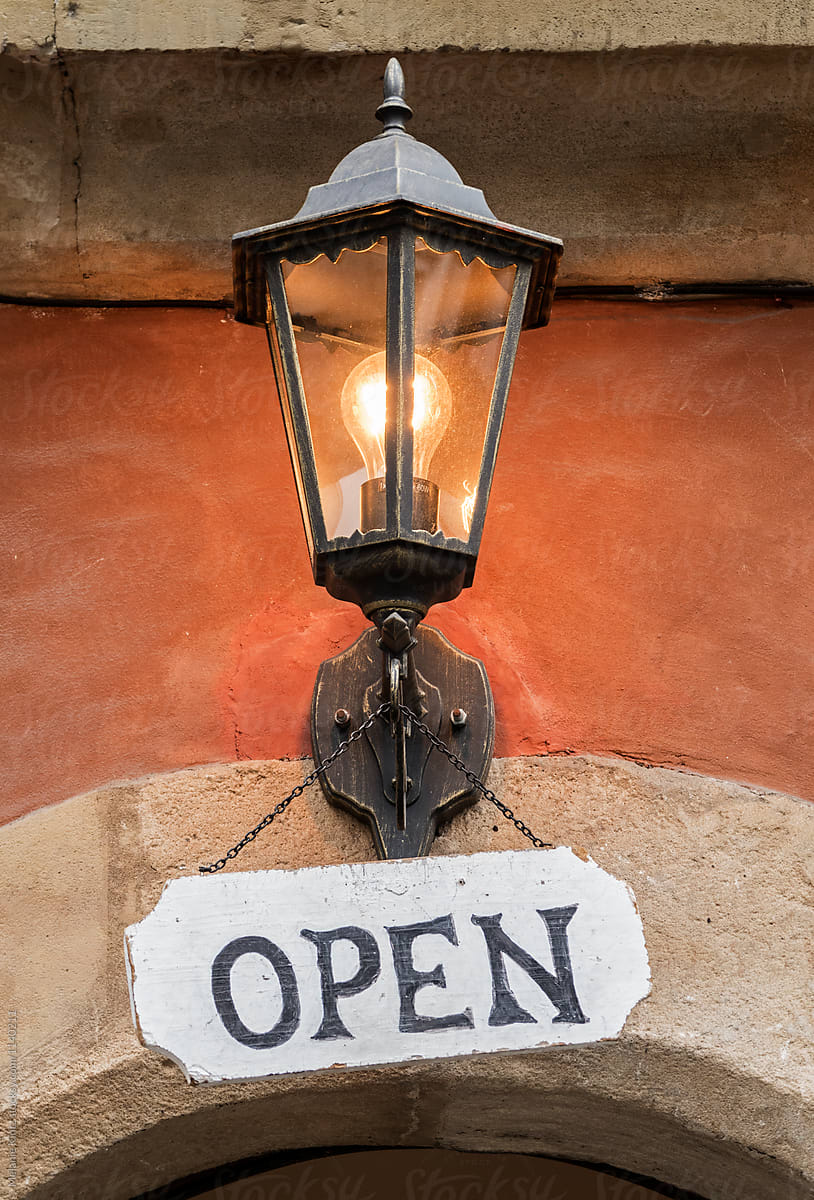 "Lamp And Sign Open Above A Store Entrance" by Stocksy Contributor ...