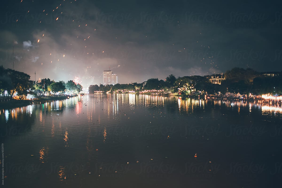 "Festive Night At The River" by Stocksy Contributor "Jovo Jovanovic ...