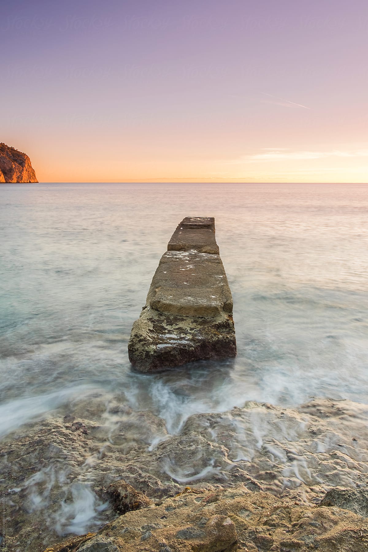 "Stone Pier In The Sea" by Stocksy Contributor "Marilar Irastorza ...