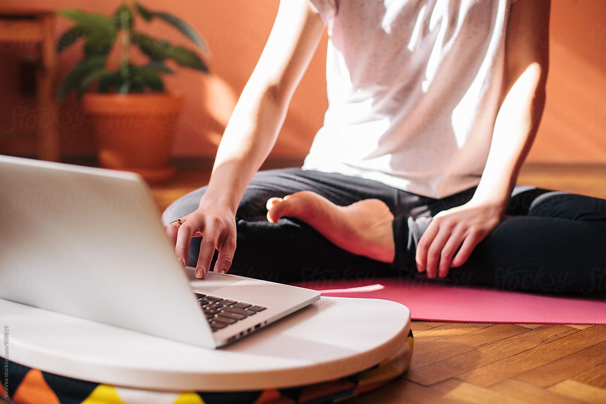 "Woman Having Home Yoga Class" by Stocksy Contributor "Marija Mandic ...