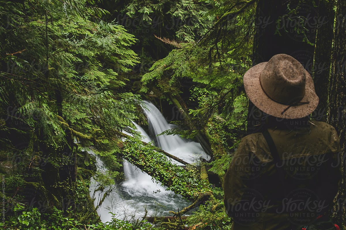 "Woman Looking Out At Waterfall" by Stocksy Contributor "Tari Gunstone ...