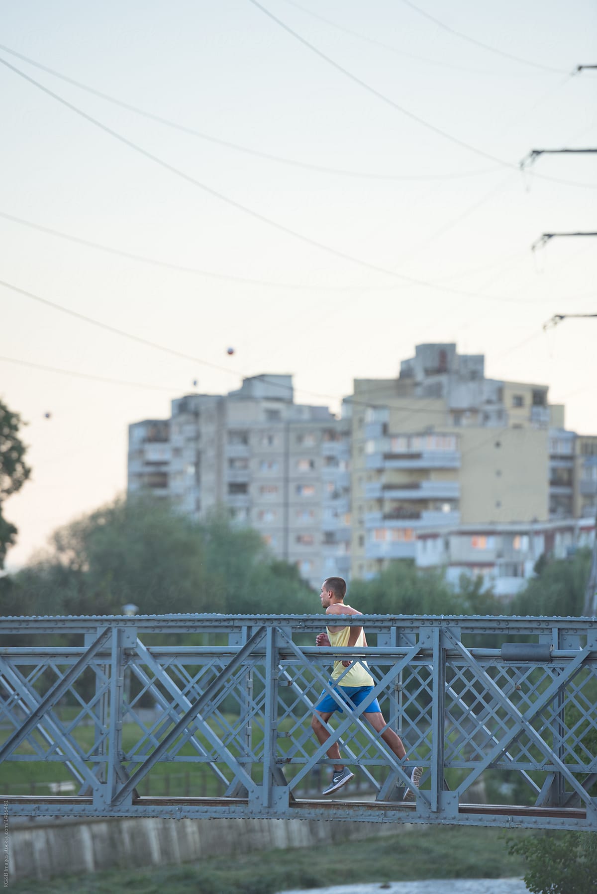 "Unrecognisable Sporty Man Jogging Outdoor In Urban Scene During" by ...
