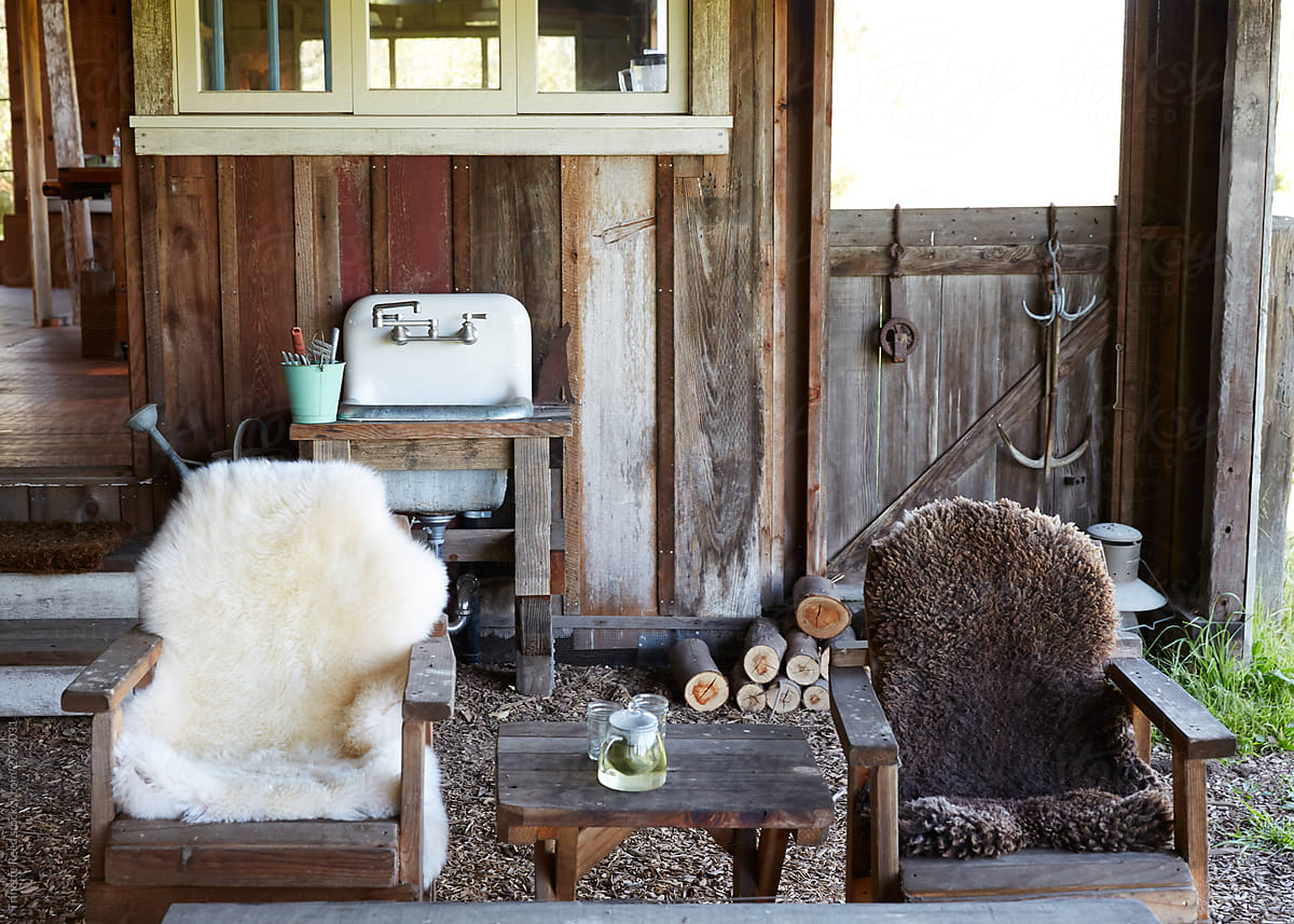 "Rustic Empty Chairs With Teapot And Lambs Wool" by Stocksy Contributor ...