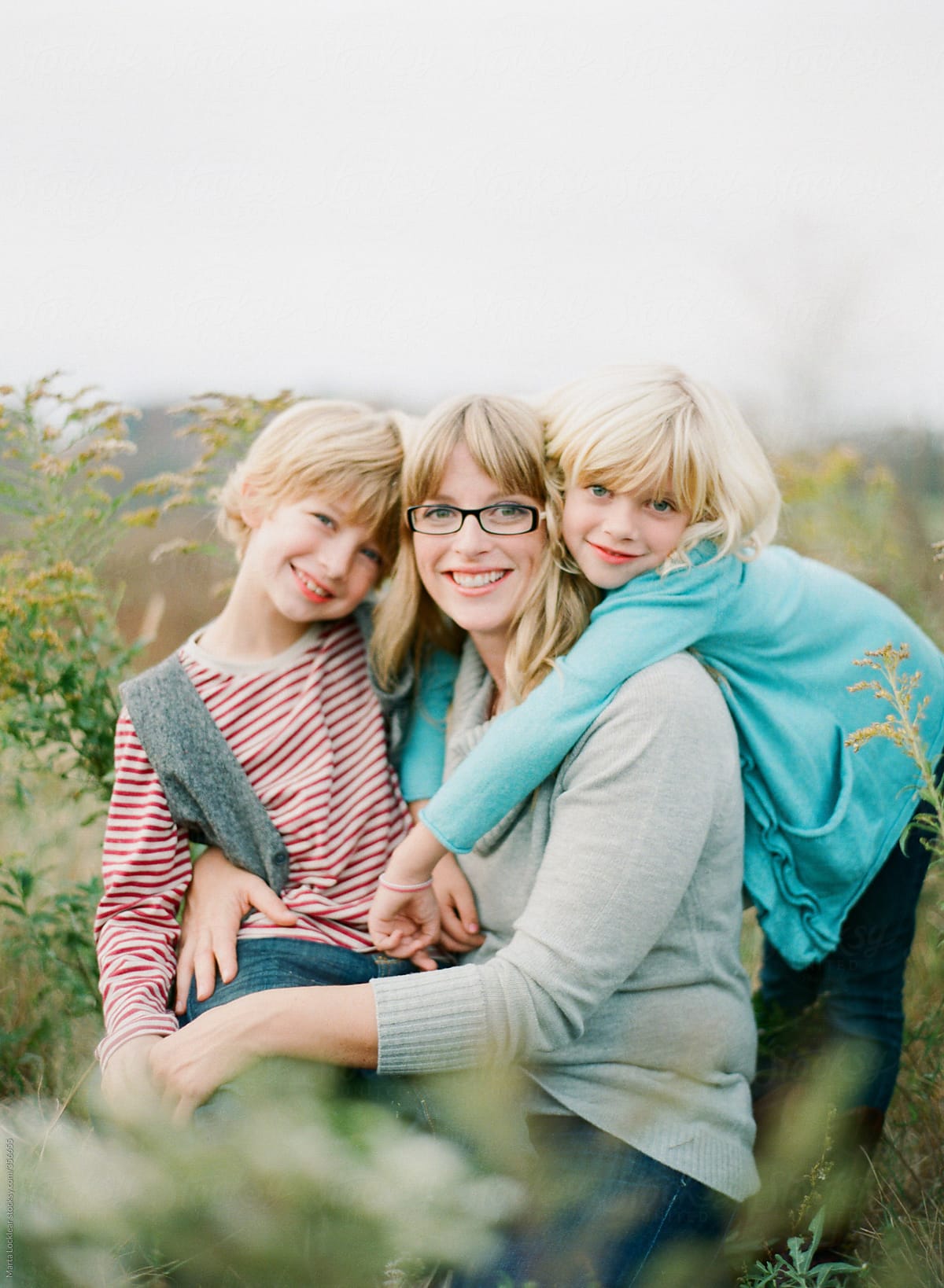 "Portrait Of A Mother And Her Two Children" by Stocksy Contributor ...