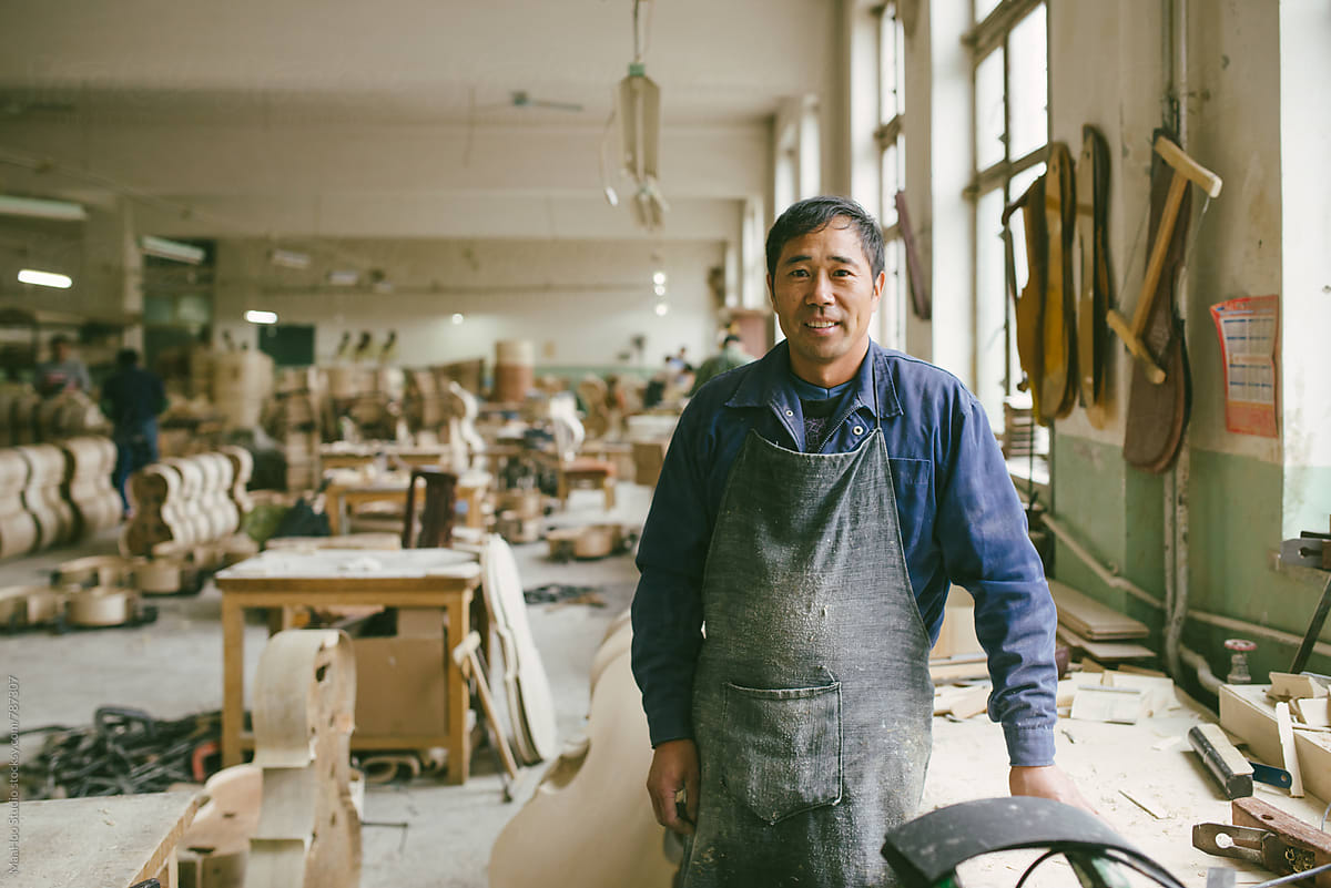 "Violoncello Maker At Work" by Stocksy Contributor "MaaHoo" - Stocksy