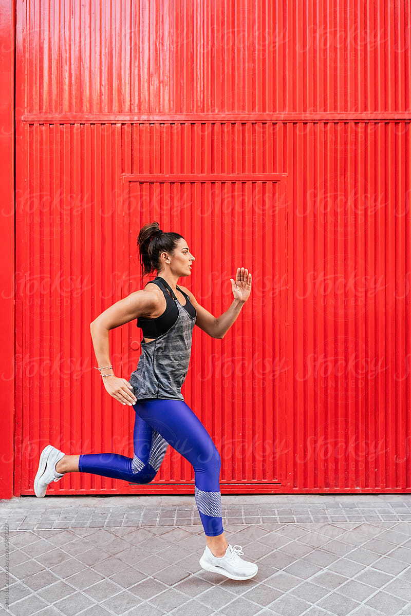 "Fitness Woman Jogging Outdoors In The City" by Stocksy Contributor ...