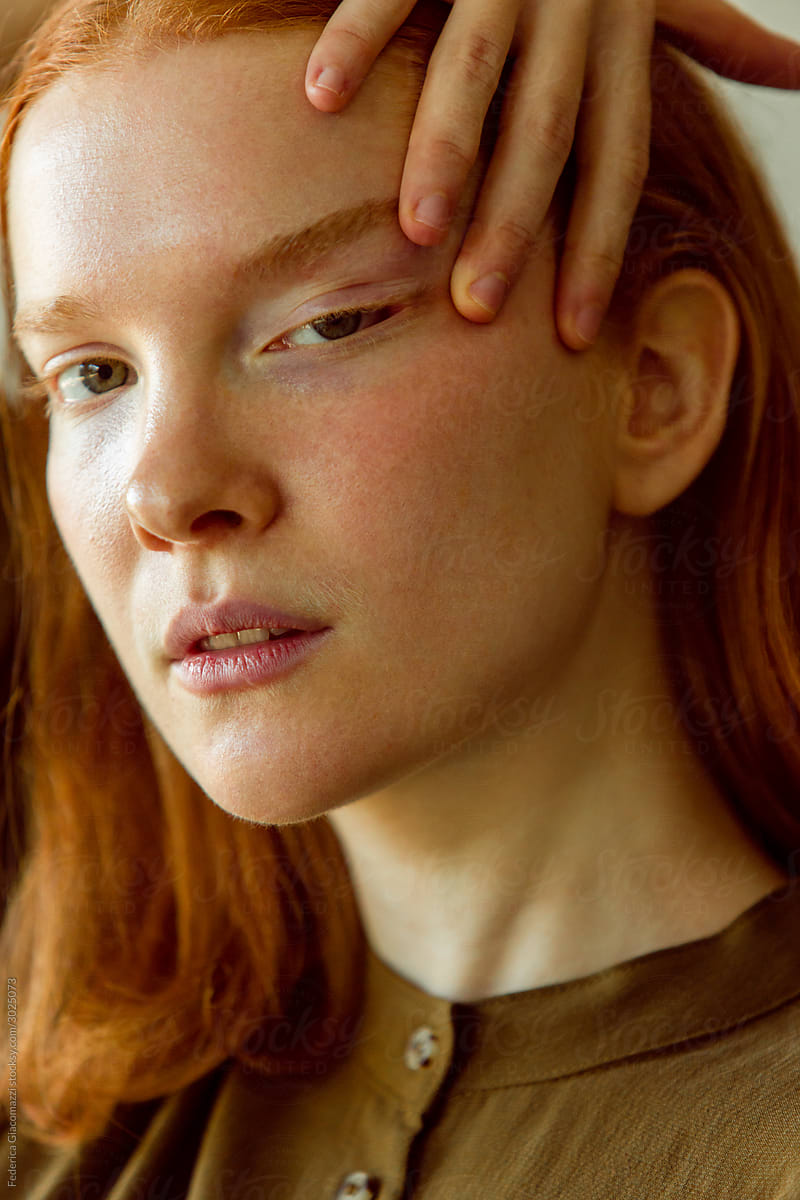 "Portrait Of A Girl Stretching Her Eye With The Hand" by Stocksy ...