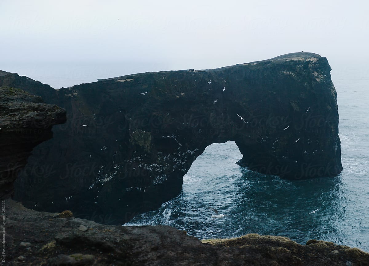 "Misty Cliff In Sea" by Stocksy Contributor "Duet Postscriptum" - Stocksy