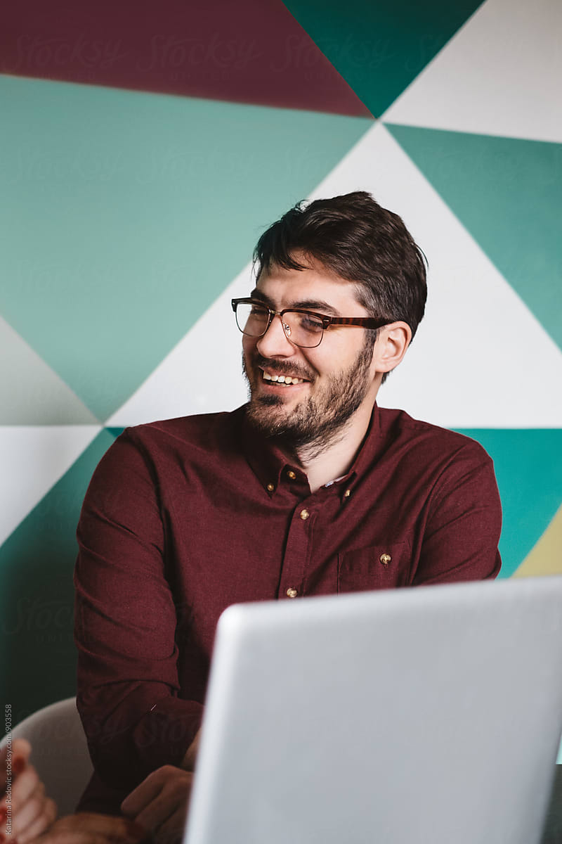 "Handsome Man At The Office" by Stocksy Contributor "Katarina Radovic ...