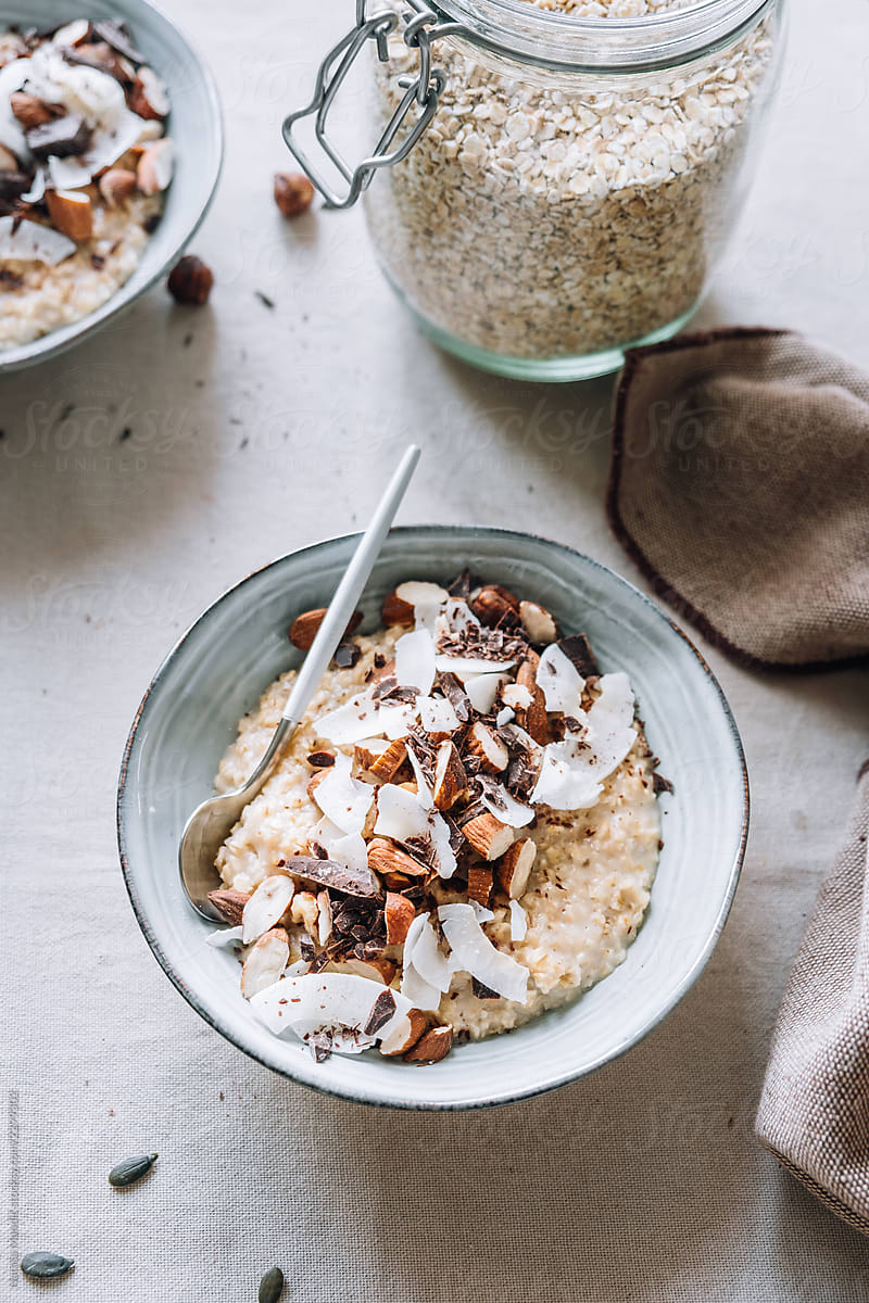 "Delicious Homemade Porridge With Nuts, Shredded Coconut And Choc" by ...