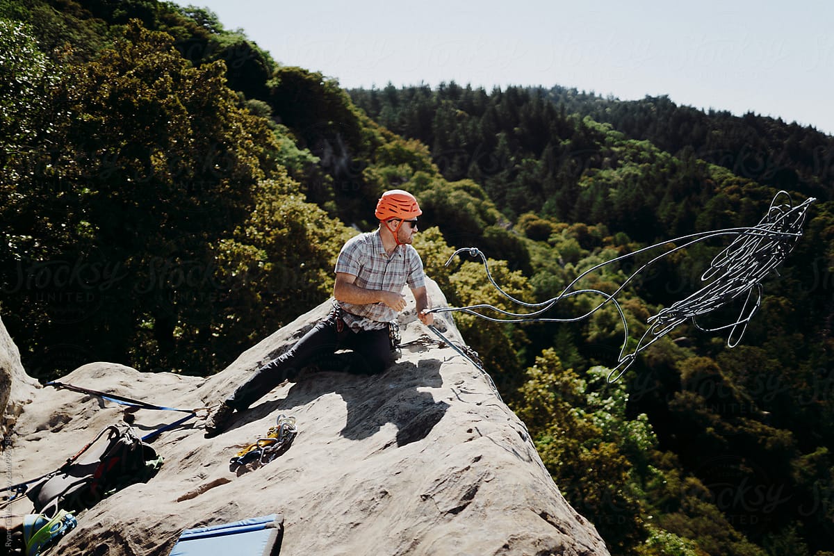 "Castle Rock Climbing" by Stocksy Contributor "Ryan Tuttle" - Stocksy