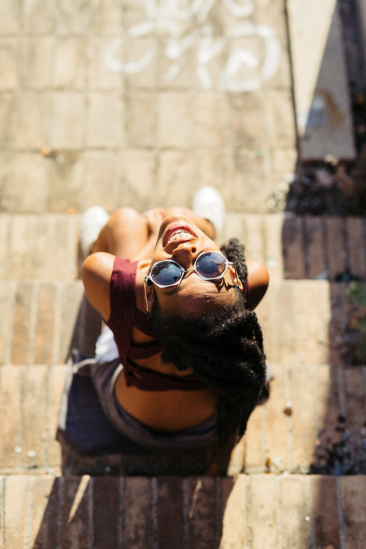 Smiling Woman Sitting On Steps By Stocksy Contributor Vero Stocksy