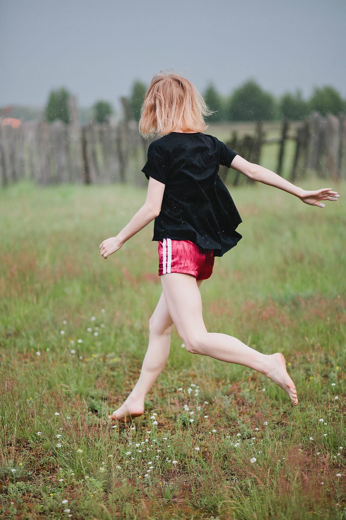 "Woman Jumping" by Stocksy Contributor "Serge Filimonov" - Stocksy